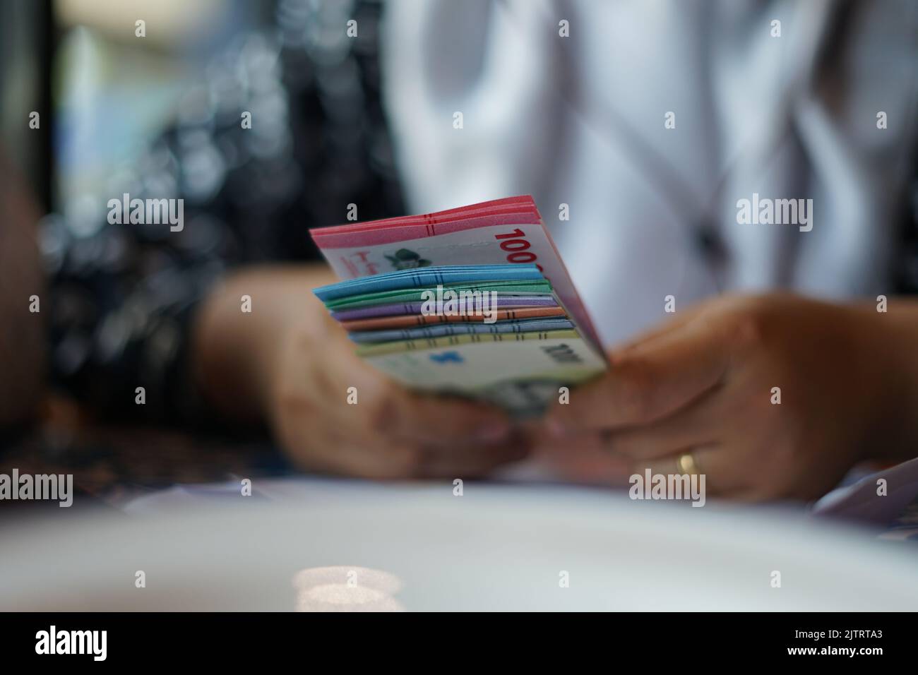 Indonesian banknotes hi-res stock photography and images - Alamy