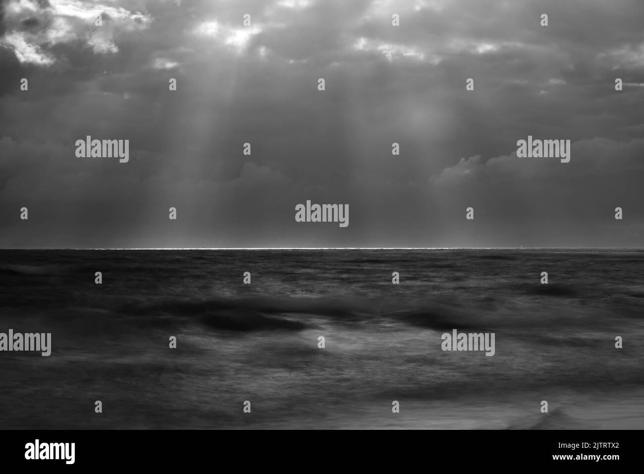 Dramatic rays light in Black and White Stock Photos & Images - Alamy