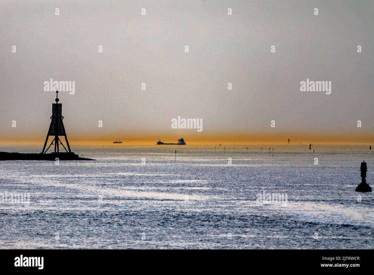 View of the North Sea at the mouth of the Elbe in the evening, left the ...