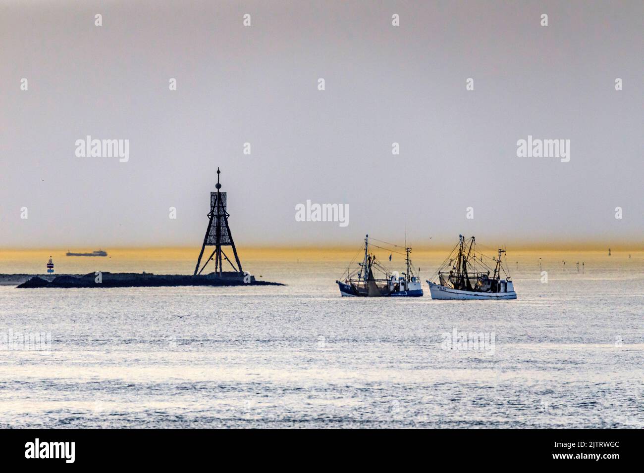 View of the North Sea at the mouth of the Elbe in the evening, left the ...