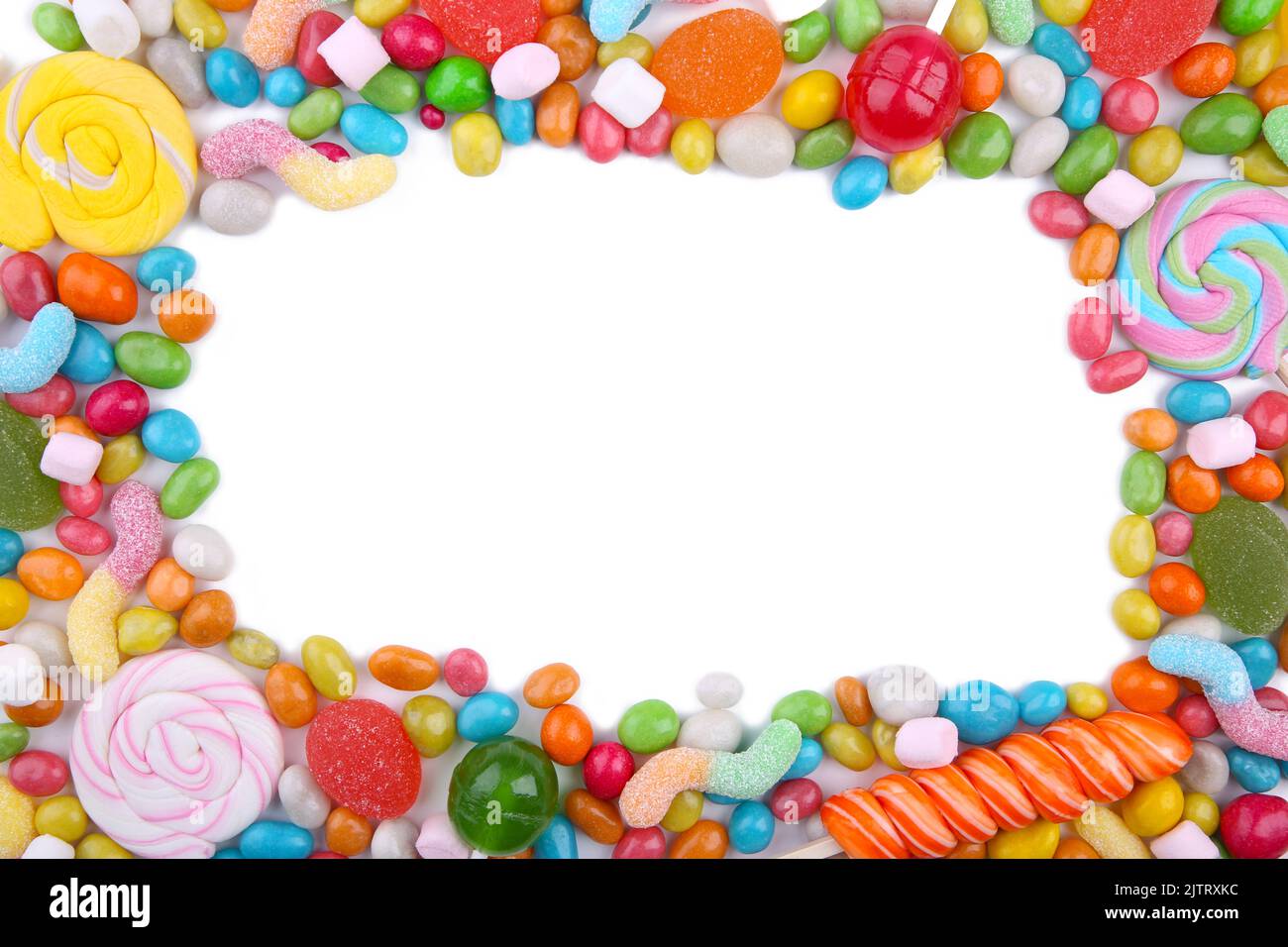 Colorful lollipops and different colored round candy isolated on white ...