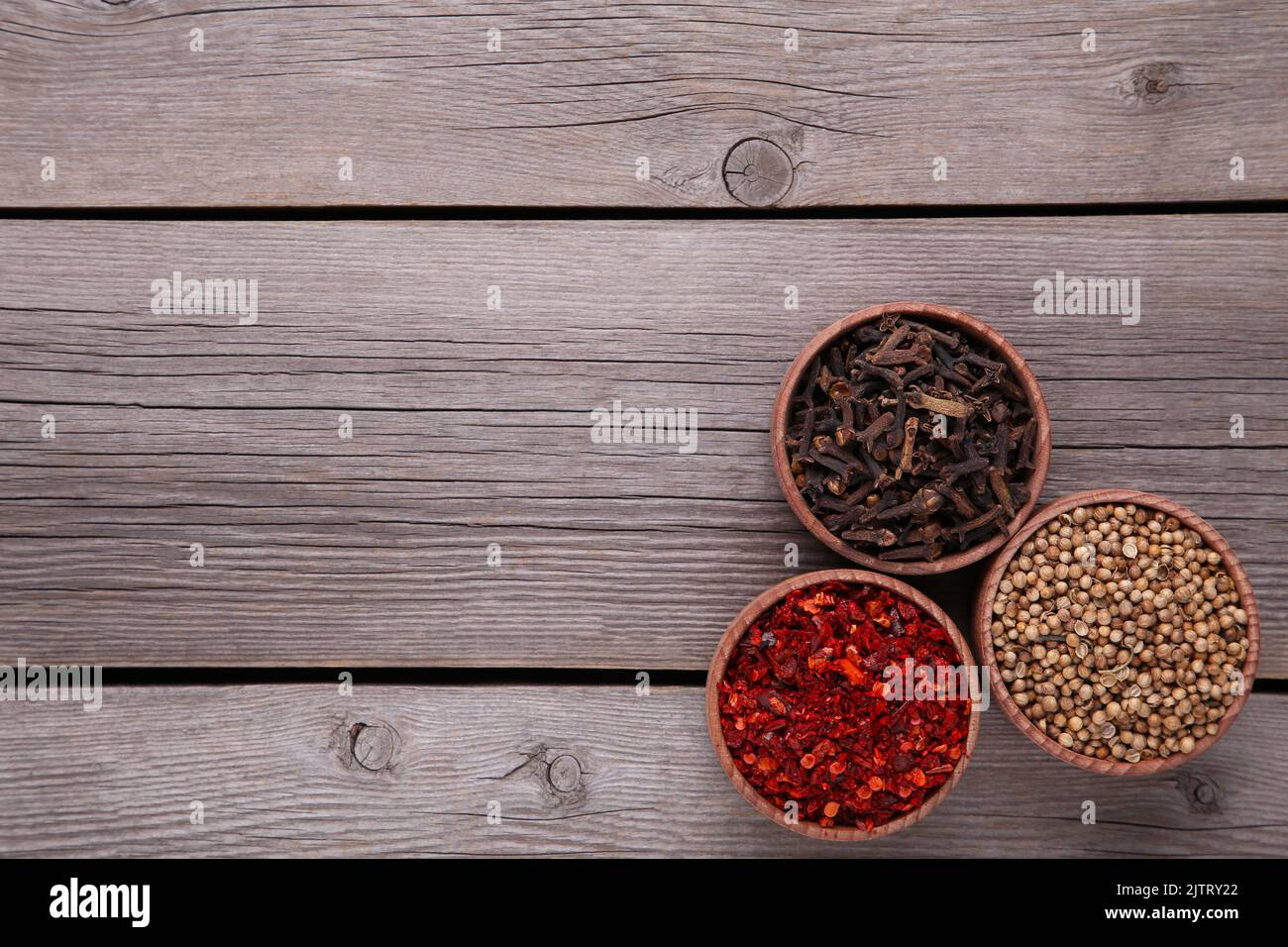 Spices mix on grey wooden background Stock Photo - Alamy