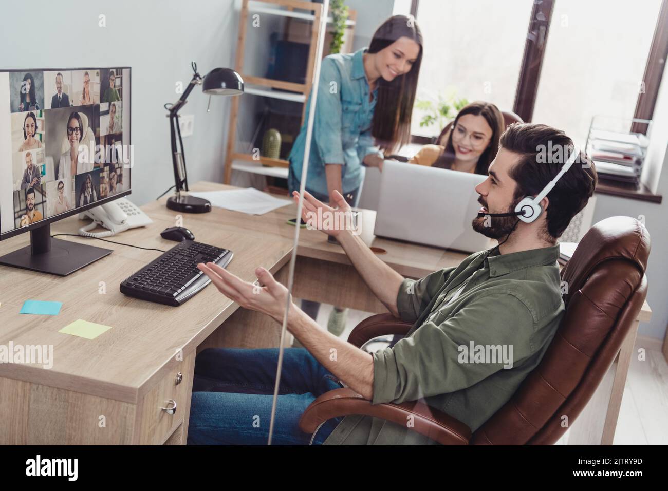 Photo of organization employees manager talk speak video call discuss ...