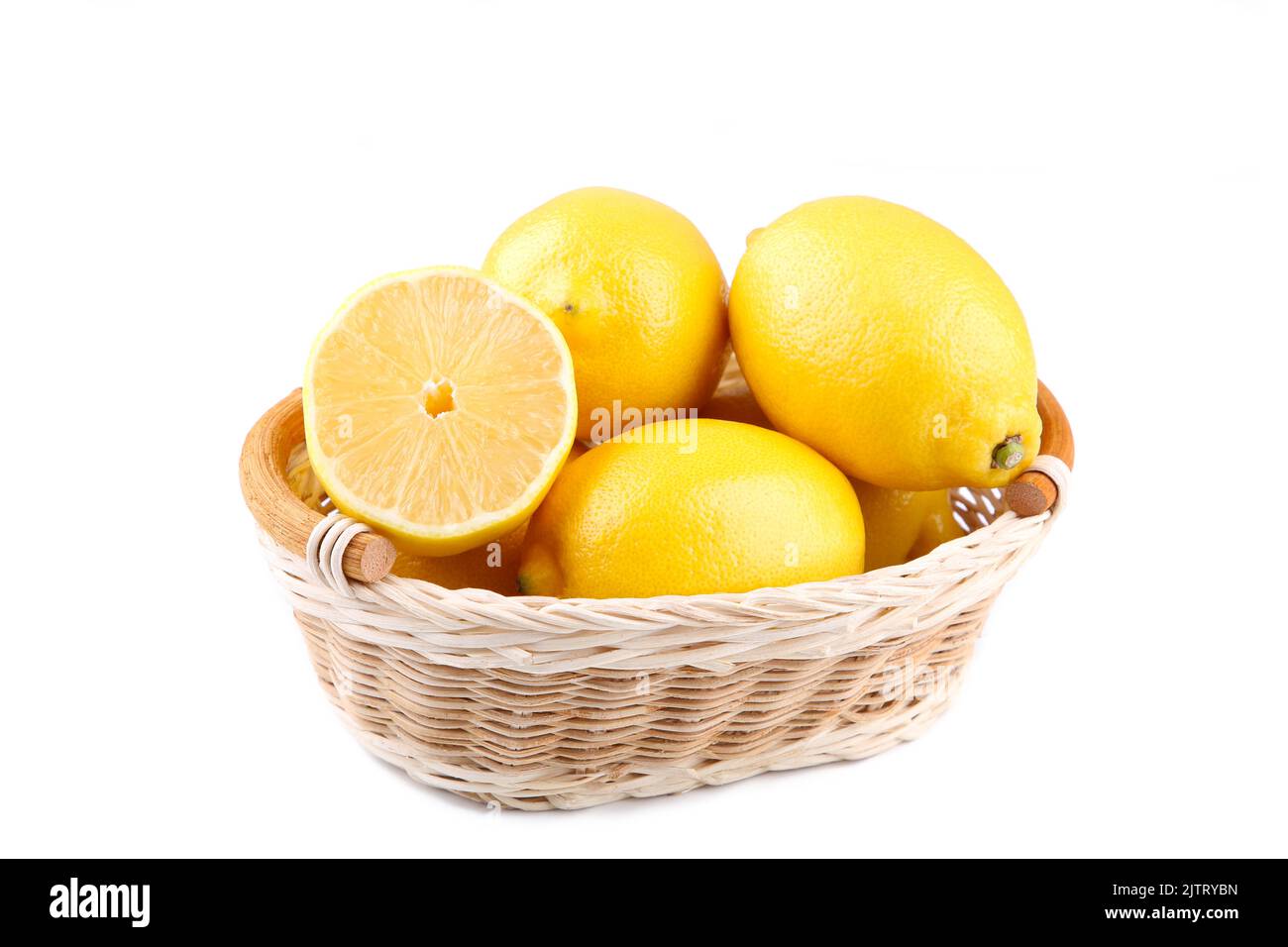 Lemon in basket isolated on white background. Fresh tropical fruit ...