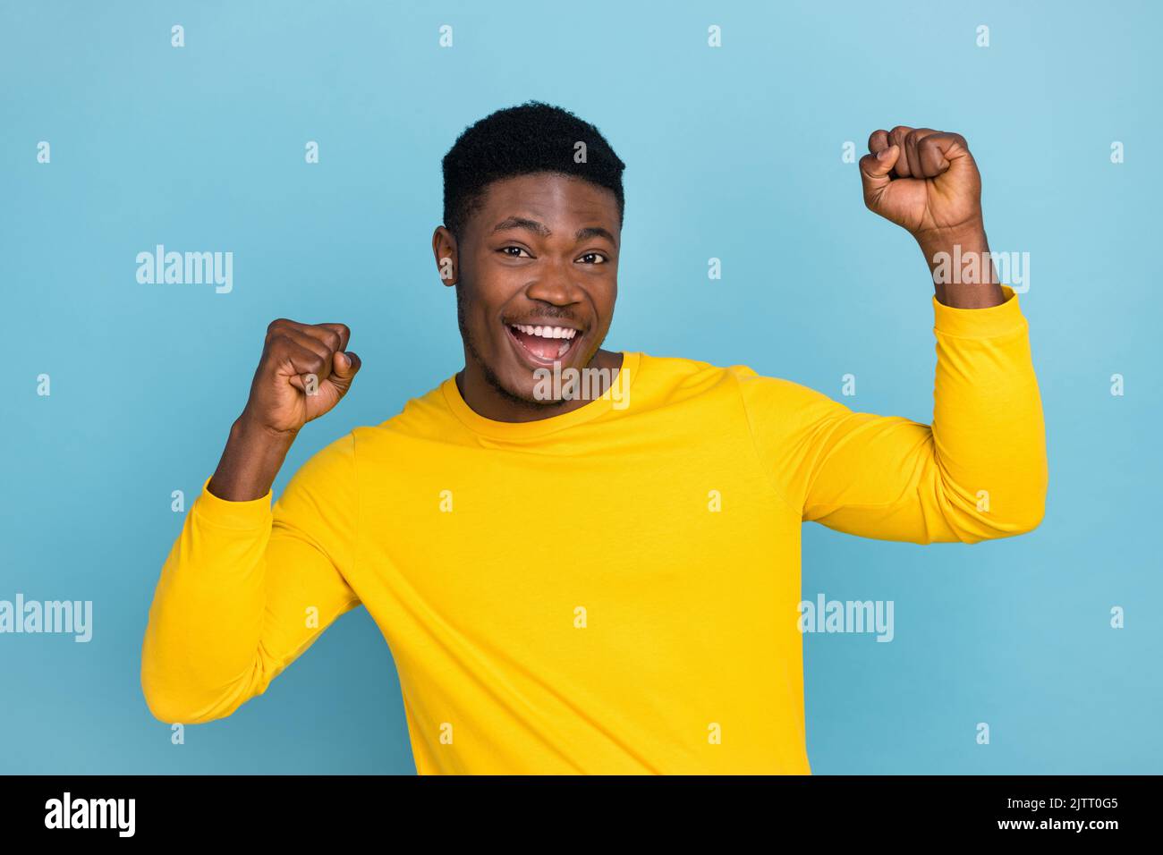 Photo of hooray young brunet guy yell wear yellow long sleeve shirt ...