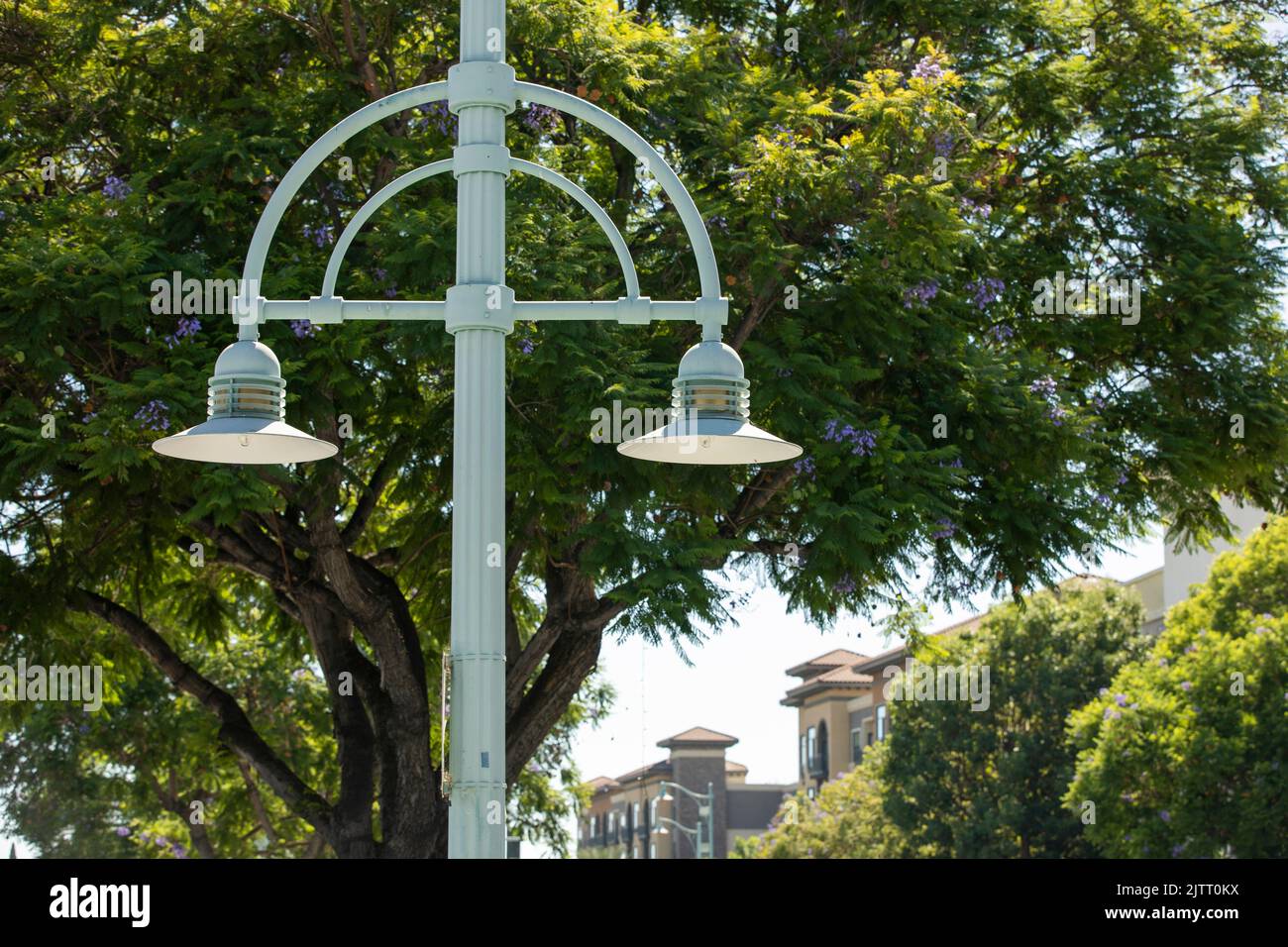 Street light framed view of downtown West Covina, California, USA Stock ...