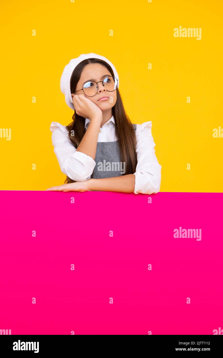 Teenage girl holds a blank for notification informing. Advertisement ...