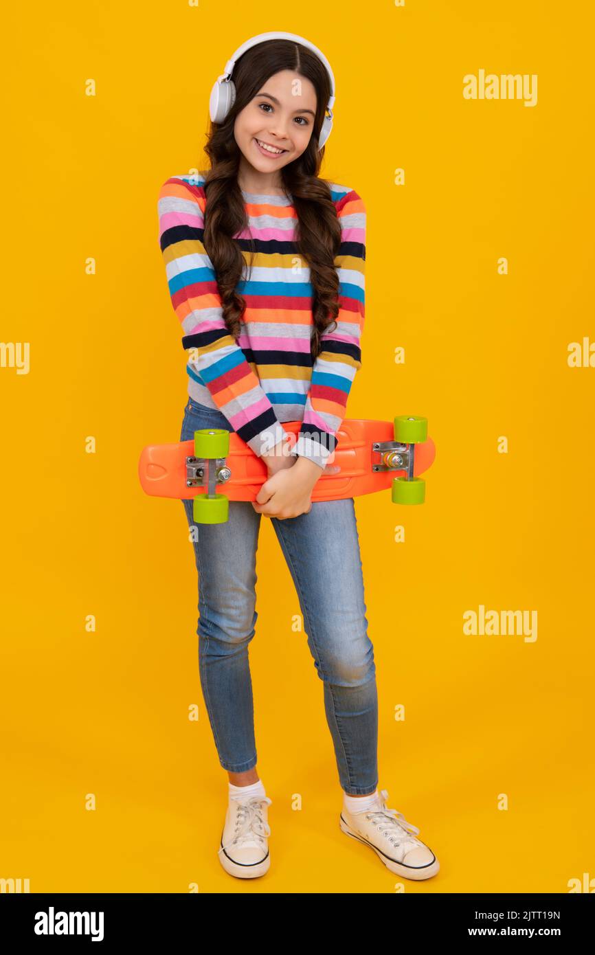 Fashion teenage lifestyle, beautiful teen girl with skateboard and ...