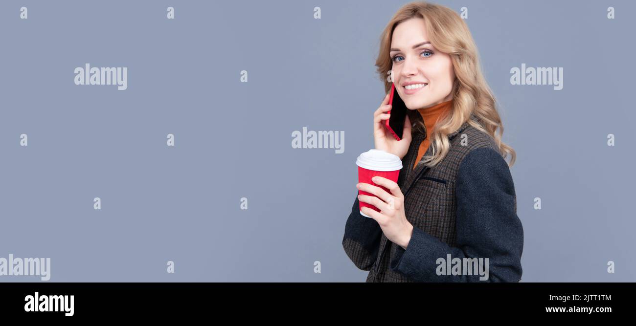 Enhanced coffee for enhanced lifestyle. Woman hold disposable cup ...