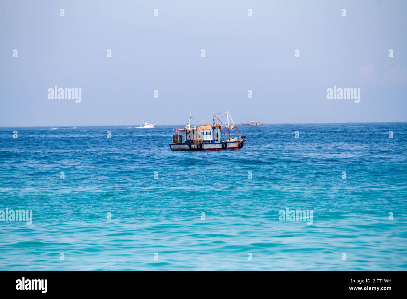 fishing boat over the sea at Ipanema beach in rio de janeiro in brazil ...