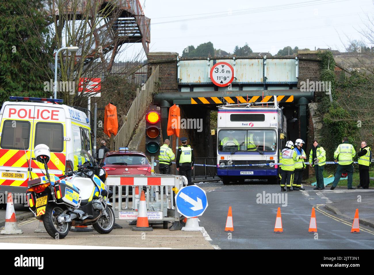 A DOUBLE DECKER BUS HAD ITS ROOF RIPPED COMPLETELY OFF AFTER IT ...
