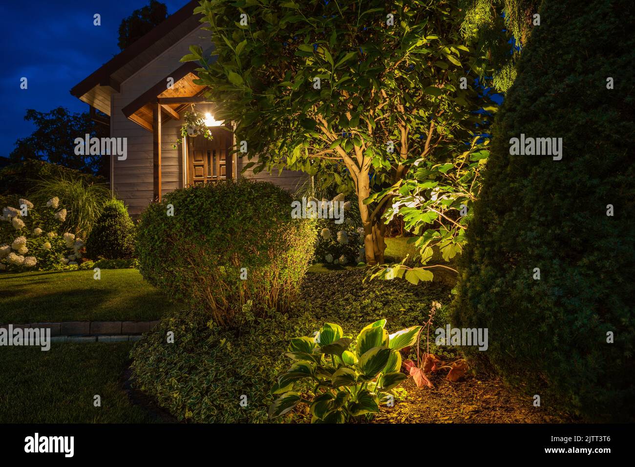 Beautifully Illuminated Backyard of Residential House. Landscape Garden ...