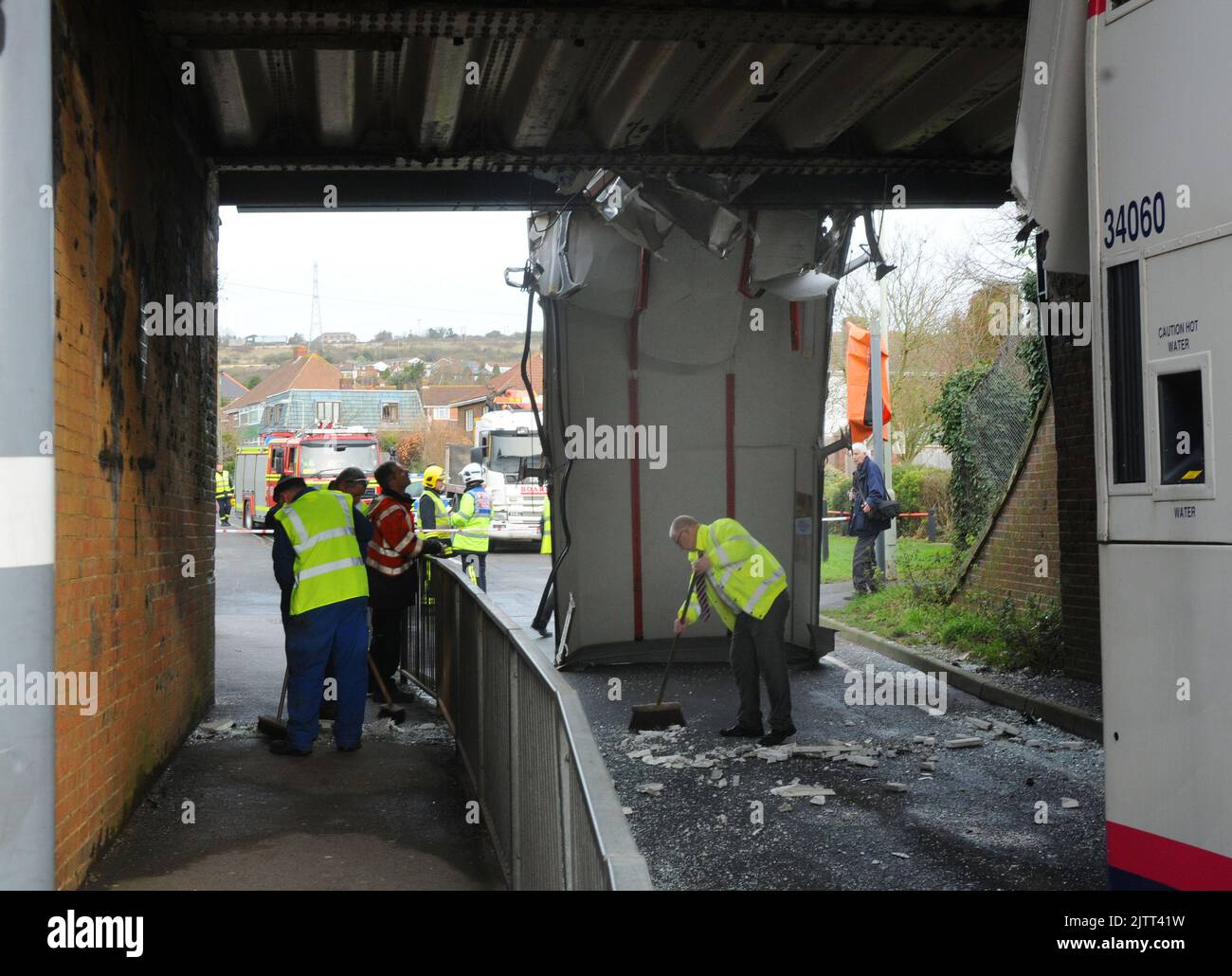 A DOUBLE DECKER BUS HAD ITS ROOF RIPPED COMPLETELY OFF AFTER IT ...