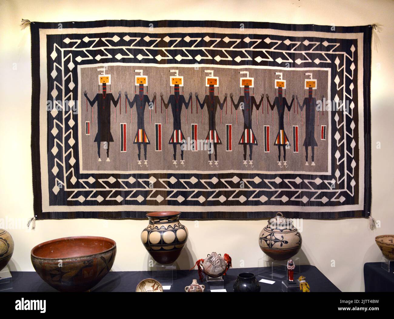 A vintage Navajo pictorial Yei wool rug, featuring Yei Be Chei (holy ...