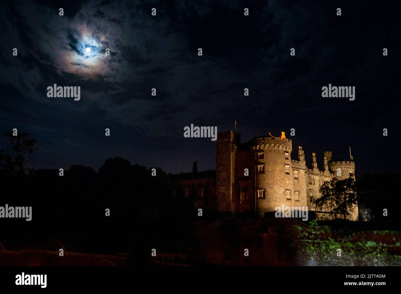 Crenellated towers of Kilkenny Castle in the medieval city of Kilkenny ...
