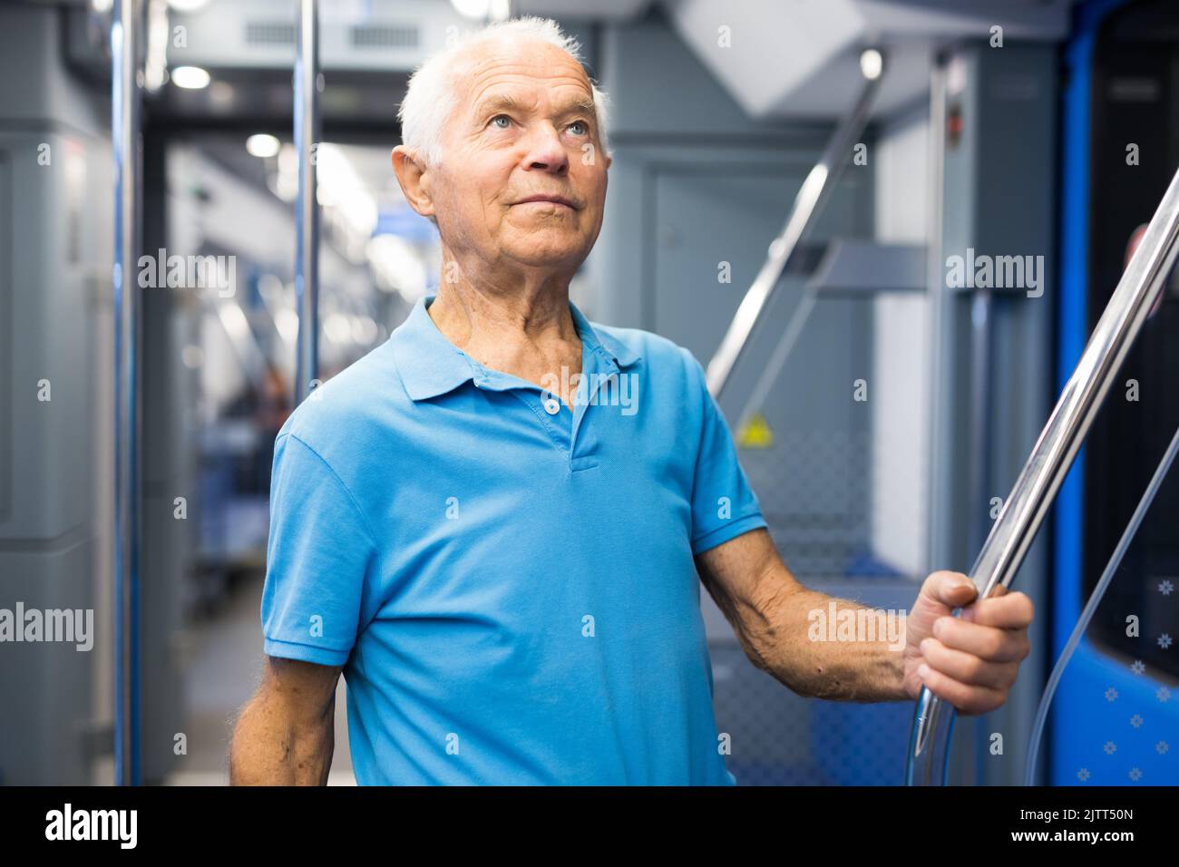 Senior man waiting train hi-res stock photography and images - Alamy