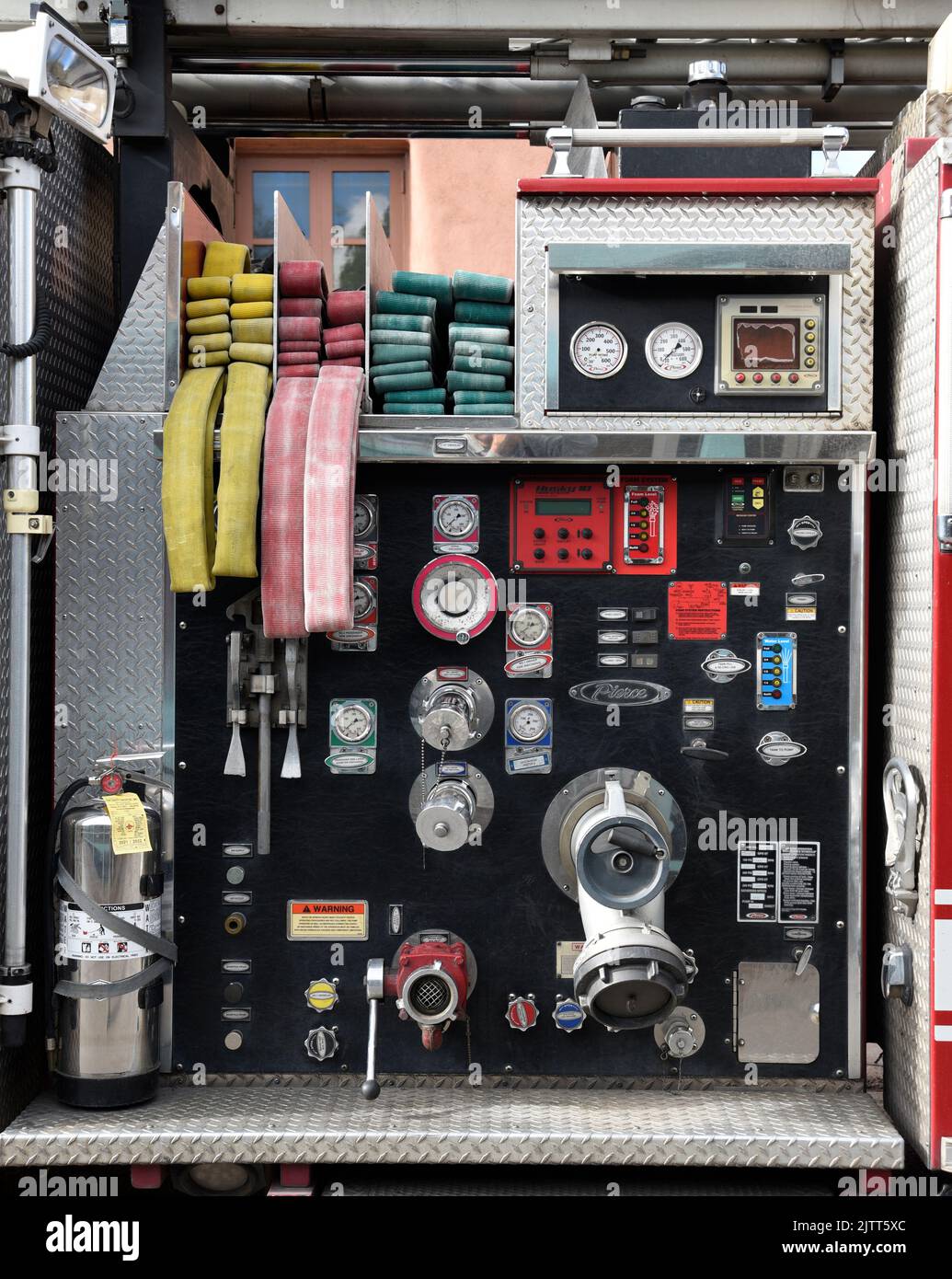 A close up photo of various hoses and gauges on a fire engine in Santa ...