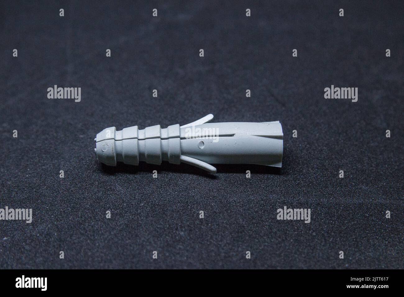 dowel in white color for fastening screw Stock Photo - Alamy