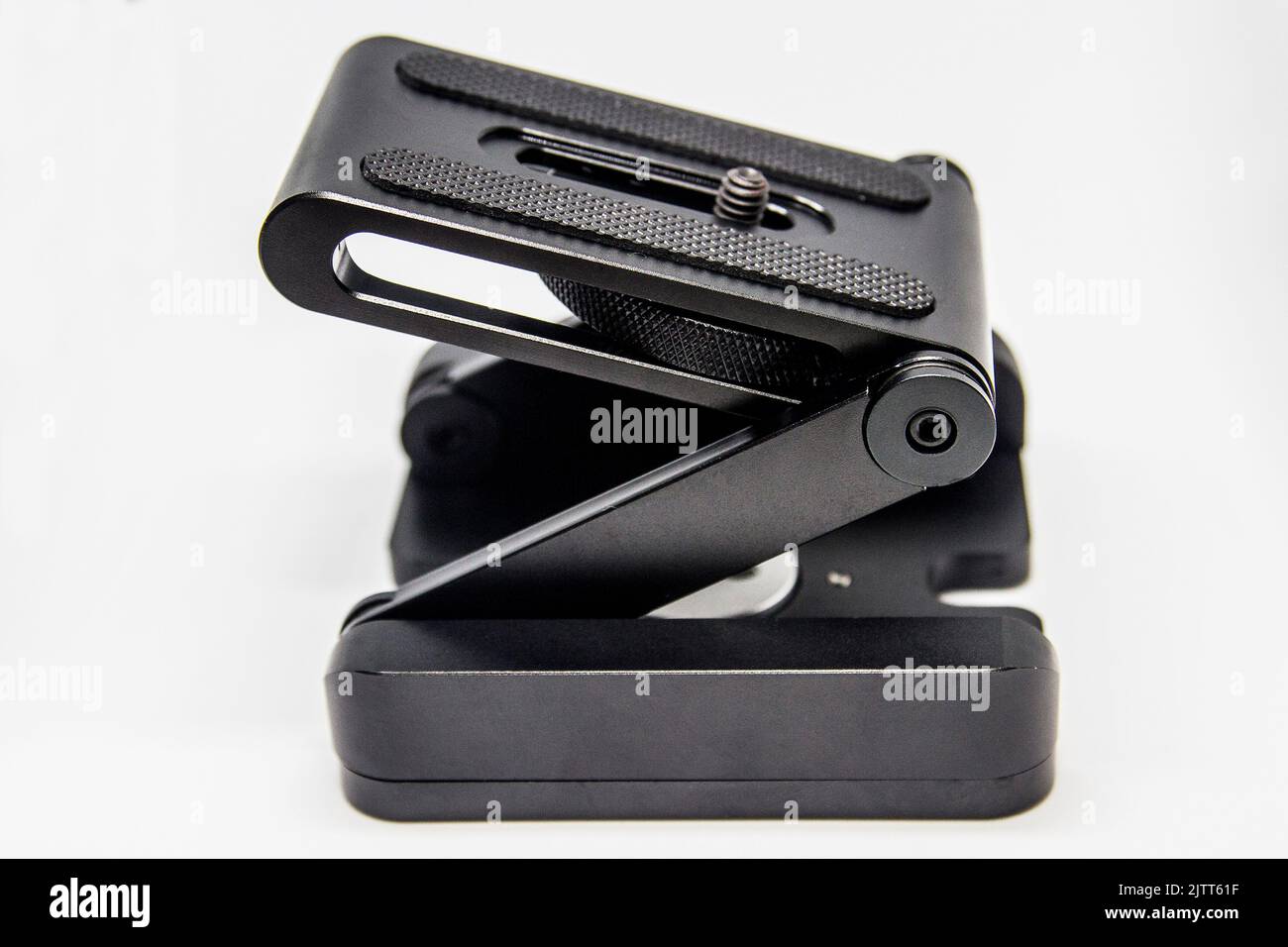 Z-shaped tripod head on a white background Stock Photo - Alamy