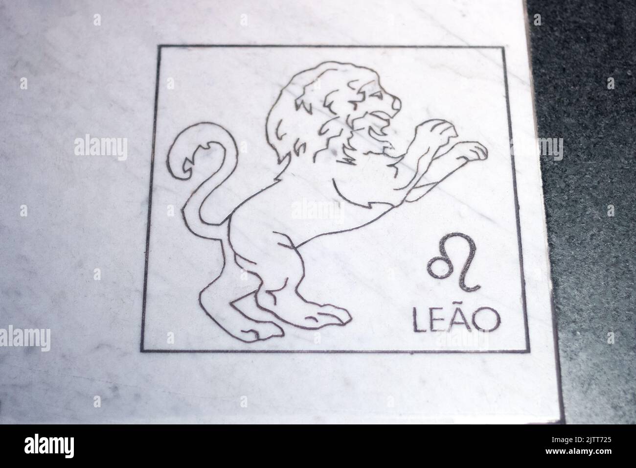 panel with lion sign on a marble stone in Rio de Janeiro Stock Photo ...