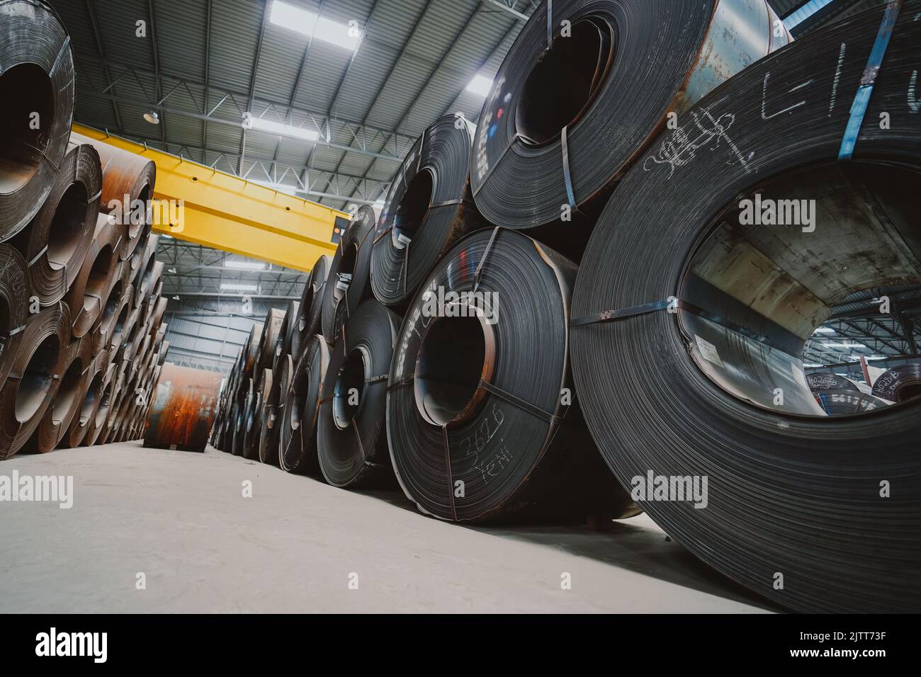 Big steel wheels in the factory Stock Photo - Alamy