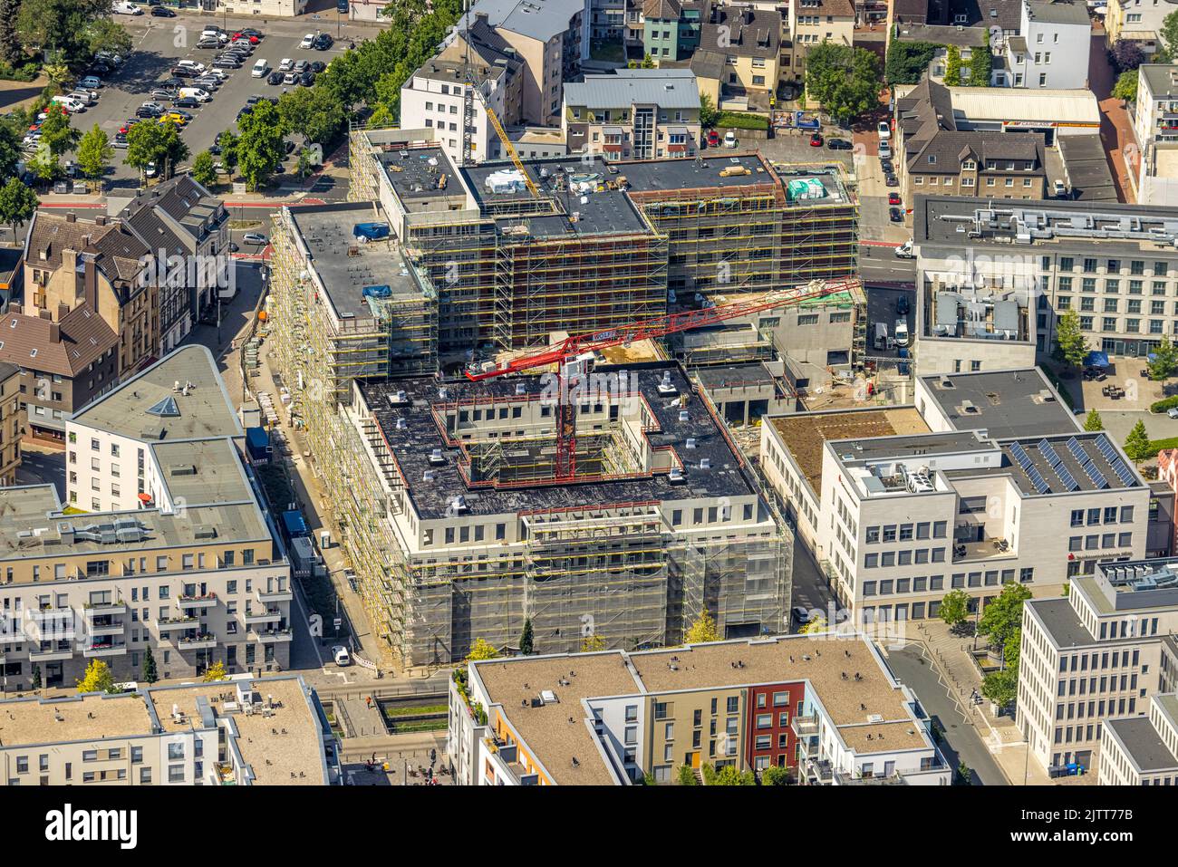 Commercial buildings with construction site rudolf platte weg corner ...