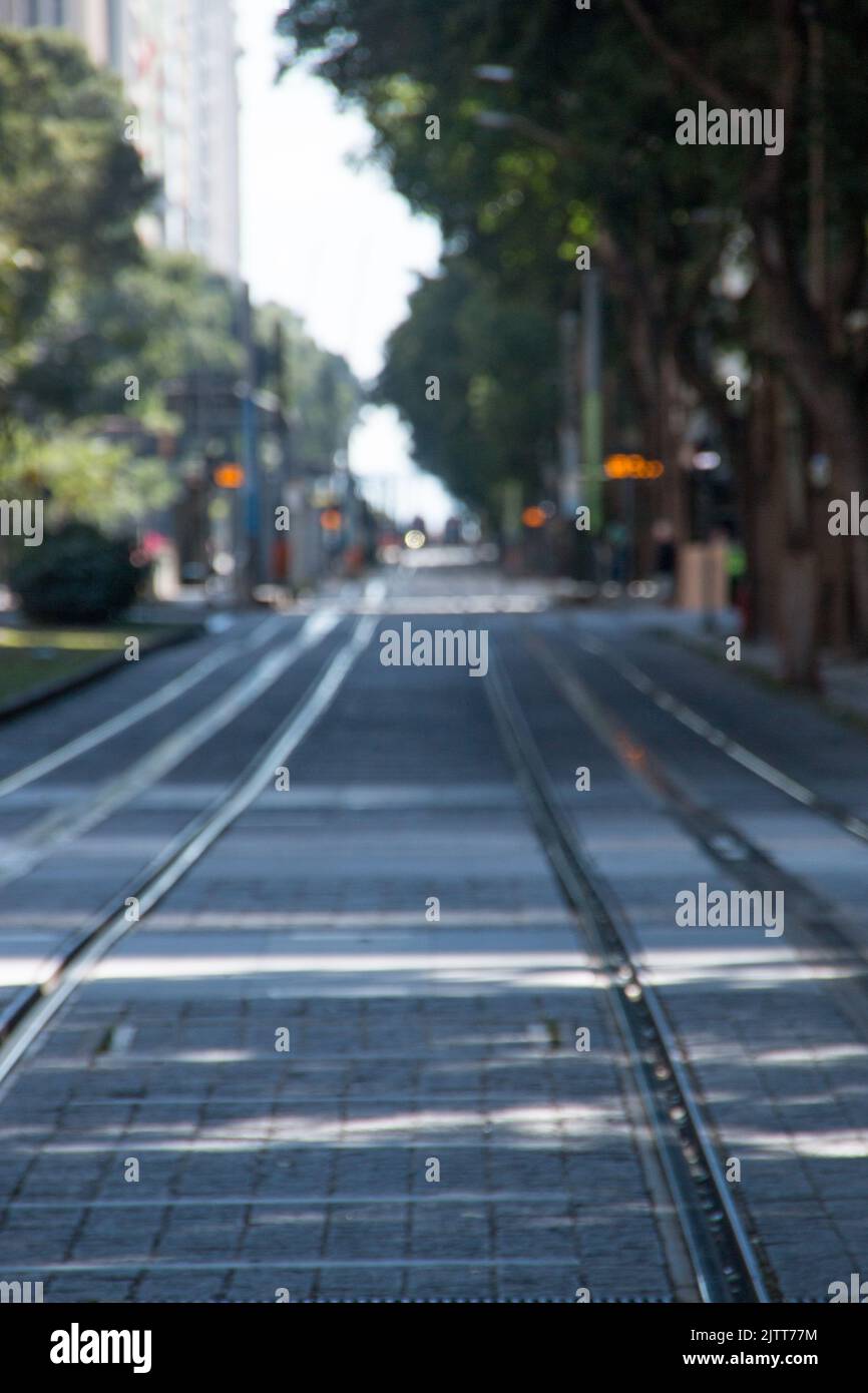 blurred tracks of the vlt passenger train in downtown Rio de Janeiro ...