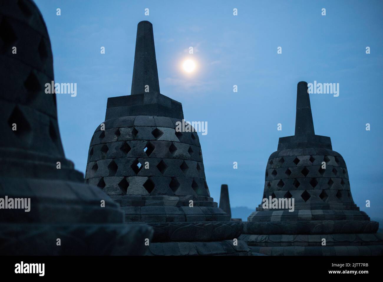 Stupas at sunrise at the ancient Buddhist Borobudur Temple outside Jogjakarta (Yogyakarta), Java ...