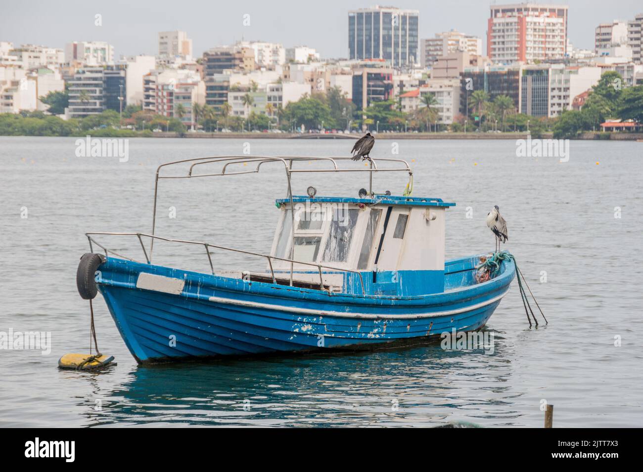 fishing boat over the Rodrigo de Freitas Lagoon in rio de janeiro in ...