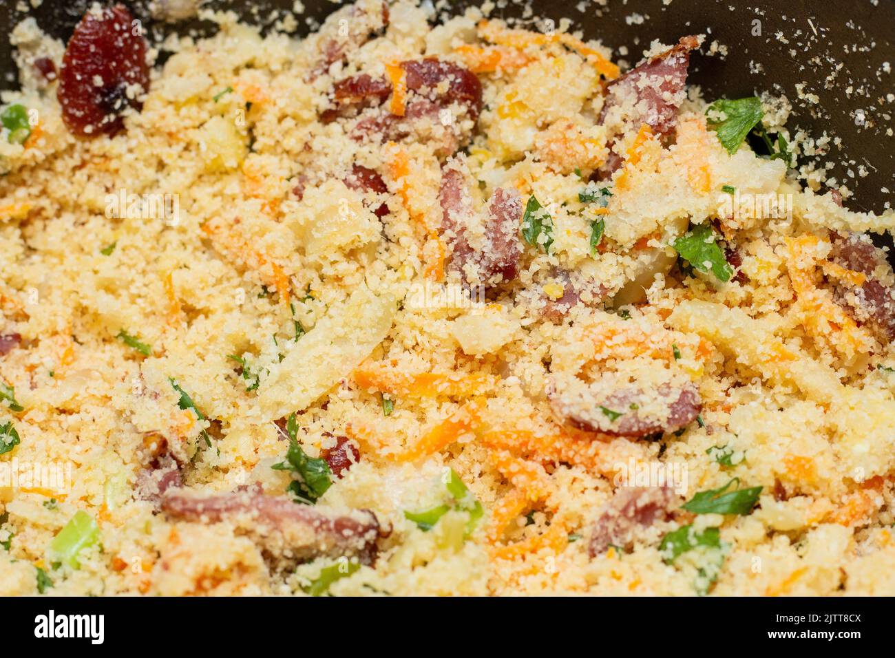 bacon crumbs with dried meat, a very popular food in Brazil Stock Photo ...