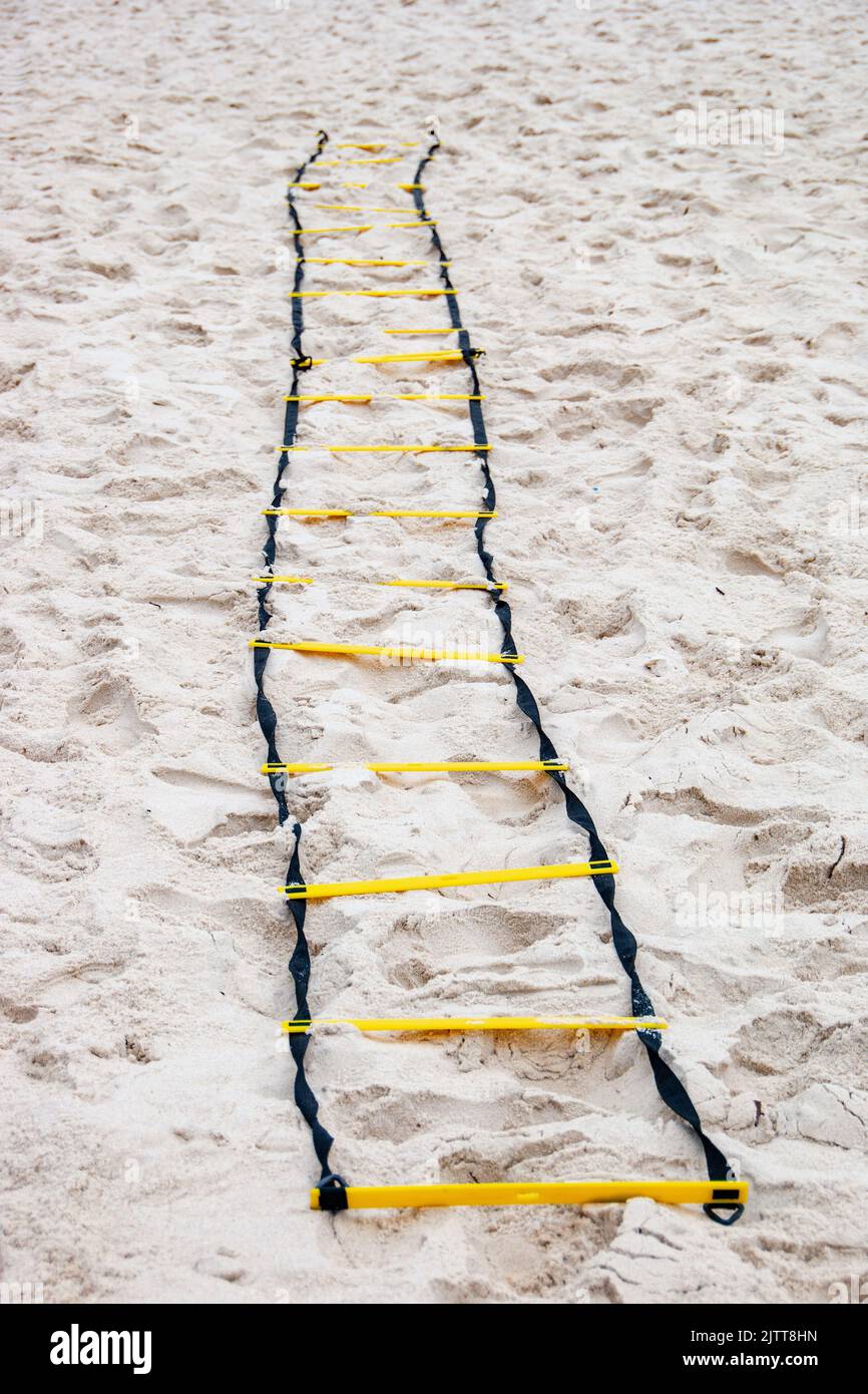 functional exercise ladder on the beach sand in Rio de Janeiro Stock ...