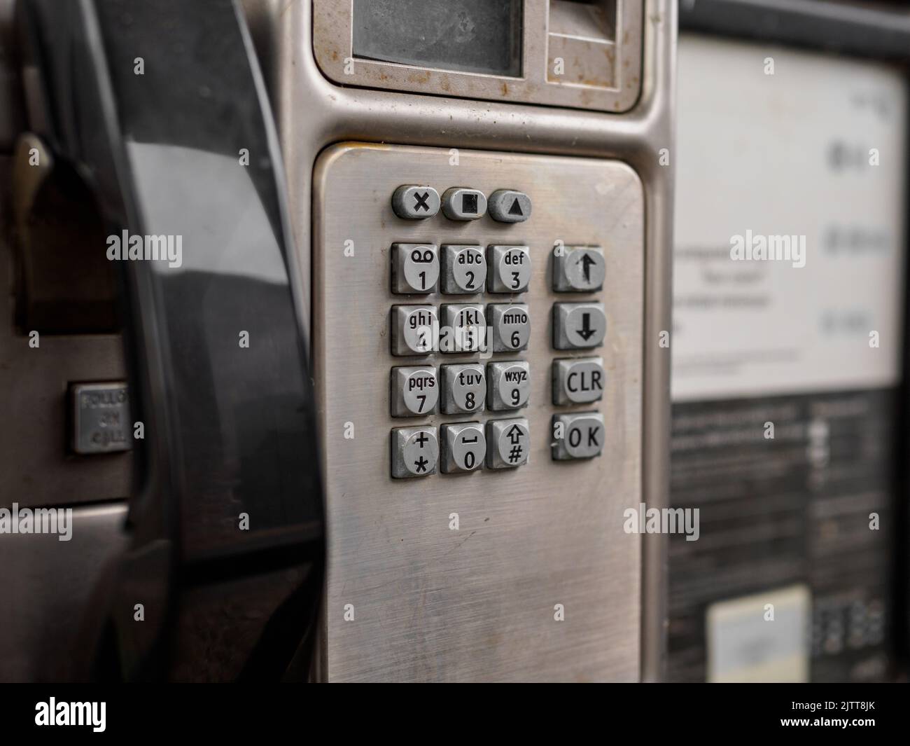 public telephone key pad in a call box UK Stock Photo - Alamy