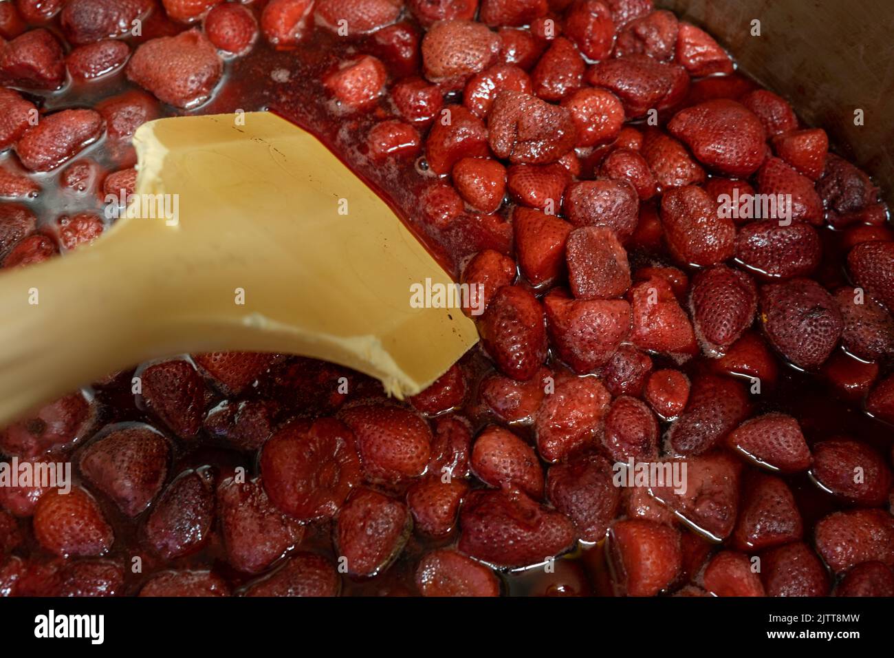 strawberries being cooked to make jam or jelly Stock Photo - Alamy