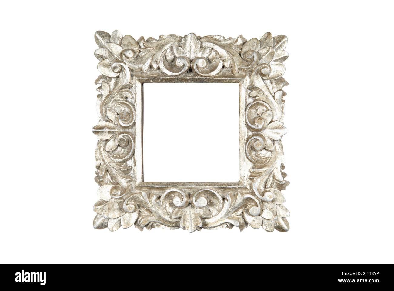 An ornate floral design square wooden frame painted in silver. Isolated ...