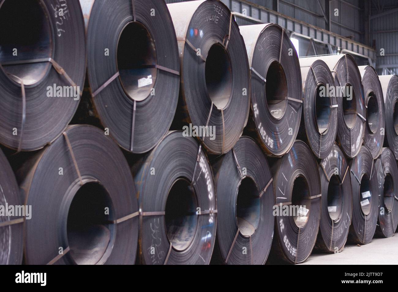 A display of domestic crude steels in a factory set up Stock Photo - Alamy