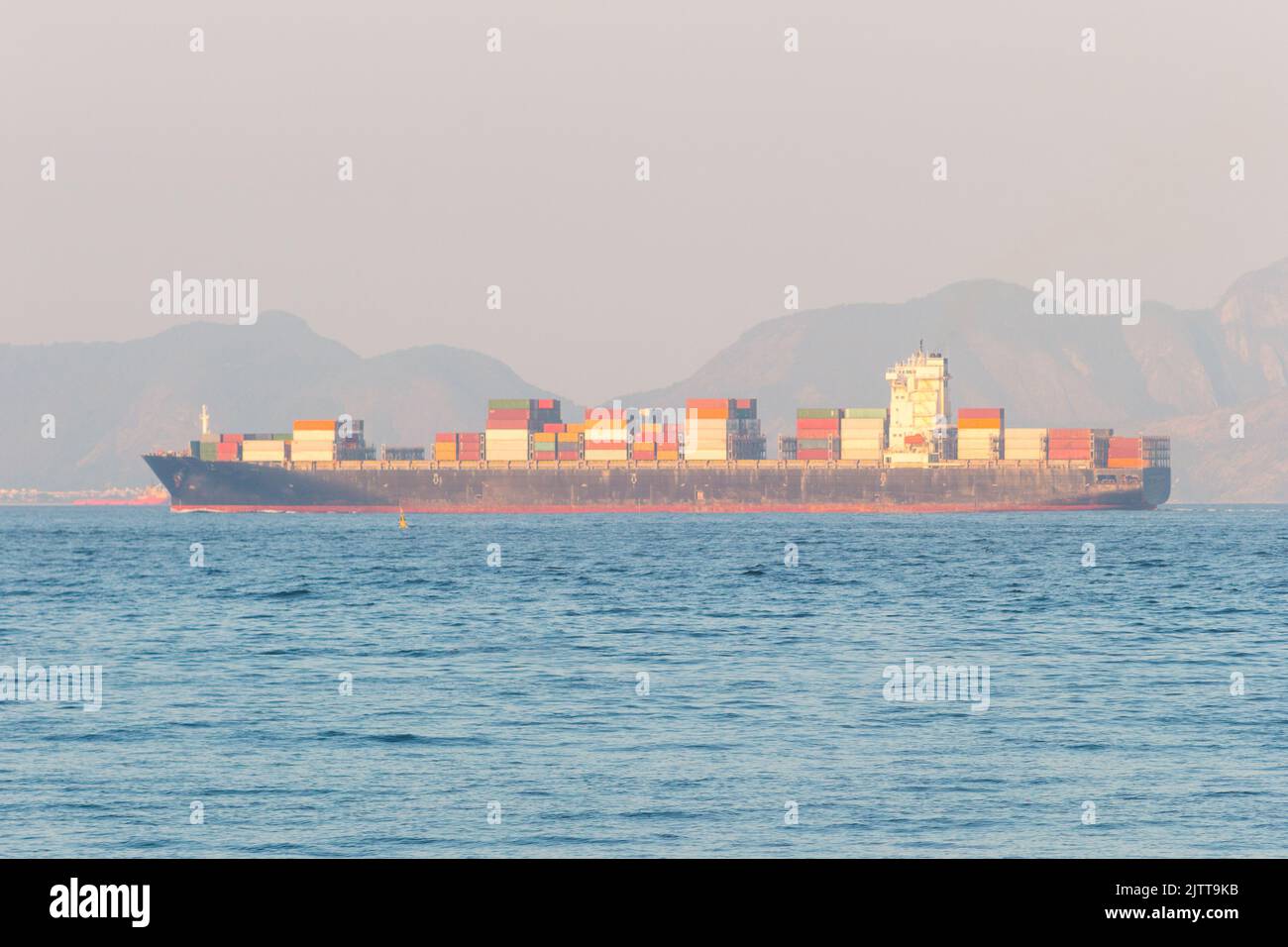 cargo ship at Copacabana beach in Rio de Janeiro, Brazil Stock Photo ...