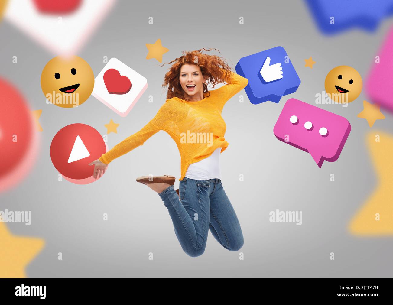 smiling young woman jumping over internet icons Stock Photo - Alamy