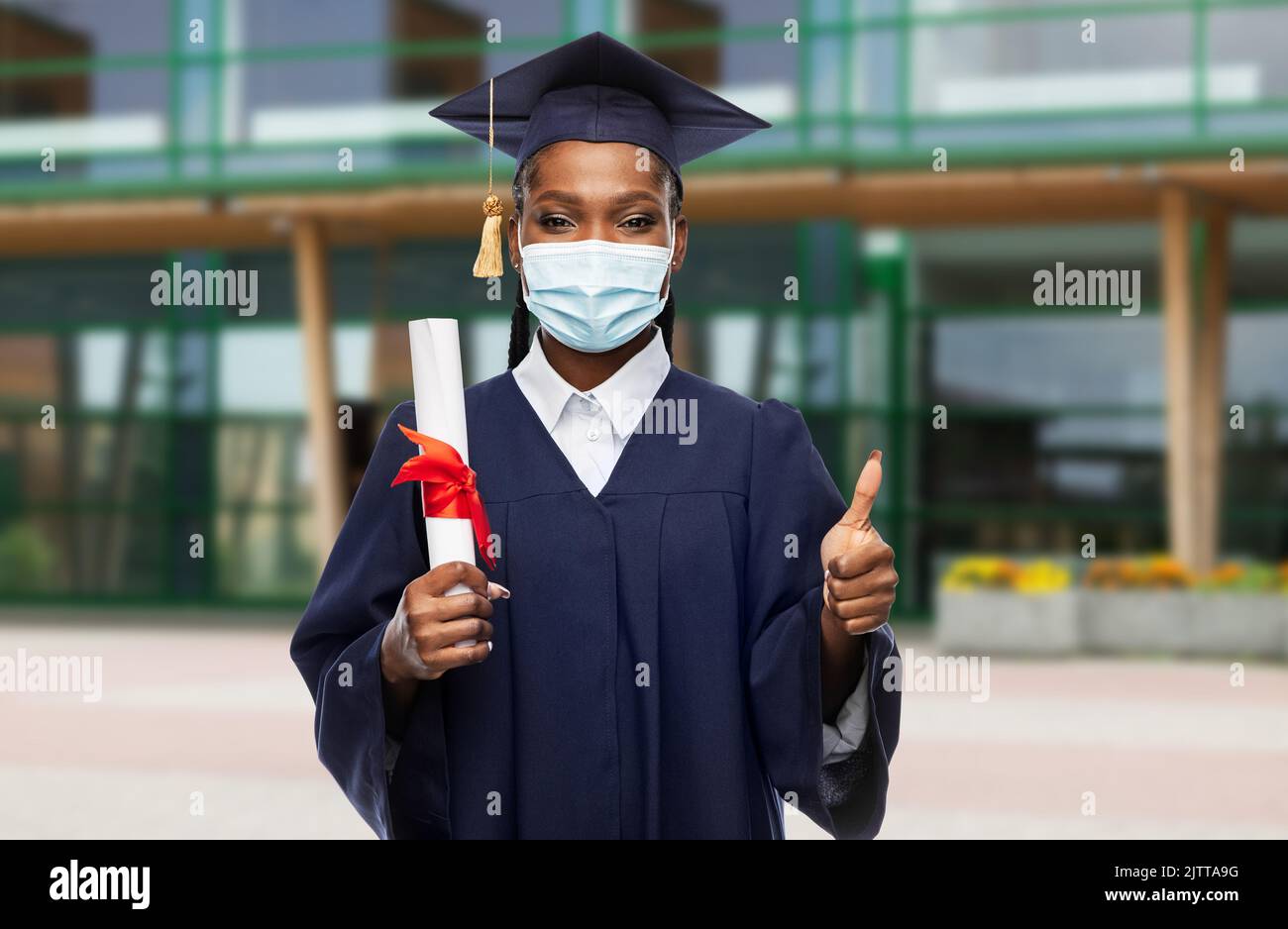 female graduate student in mask with diploma Stock Photo - Alamy