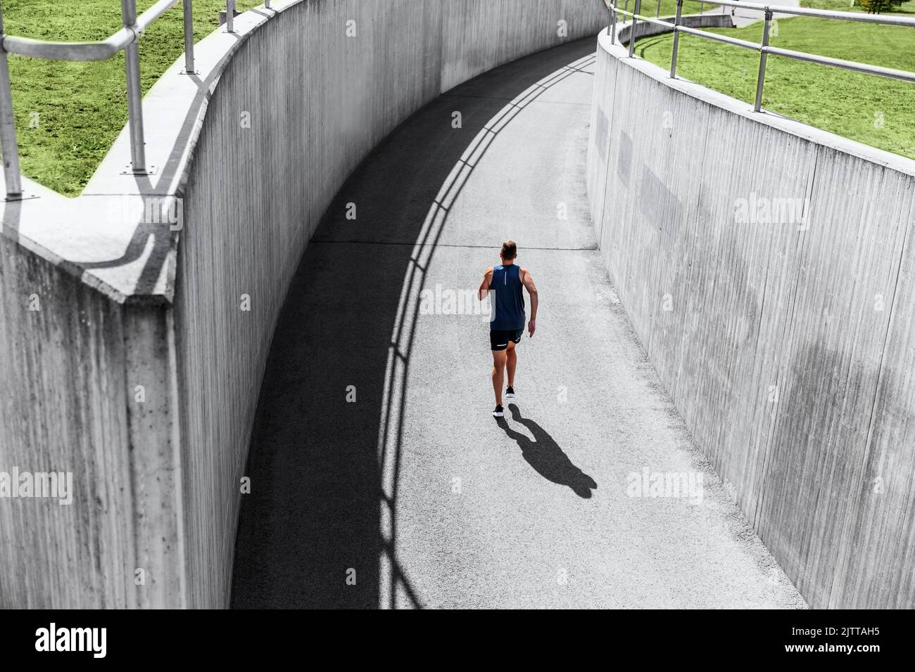 young man running in tunnel outdoors Stock Photo - Alamy