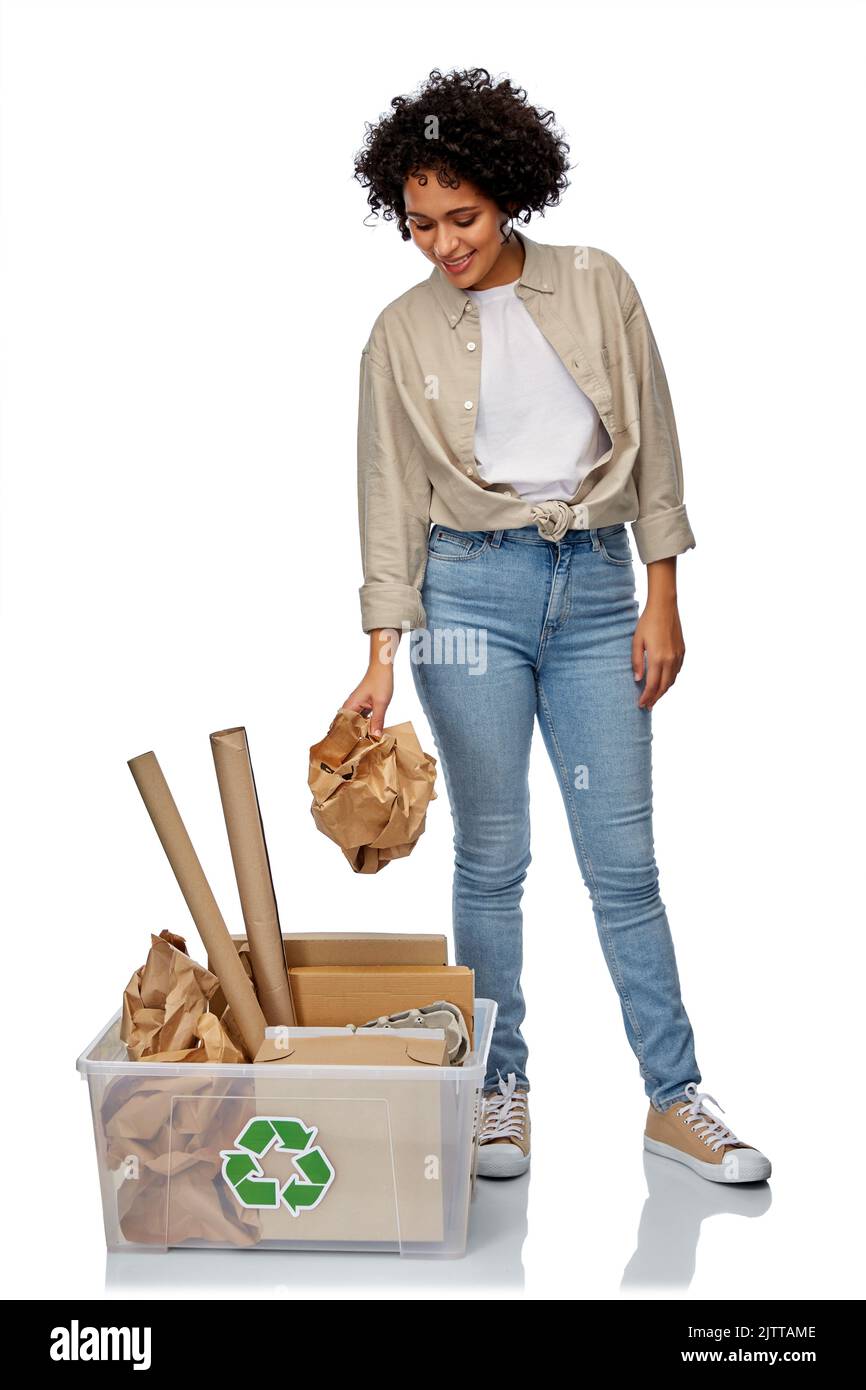 happy woman sorting paper waste Stock Photo - Alamy