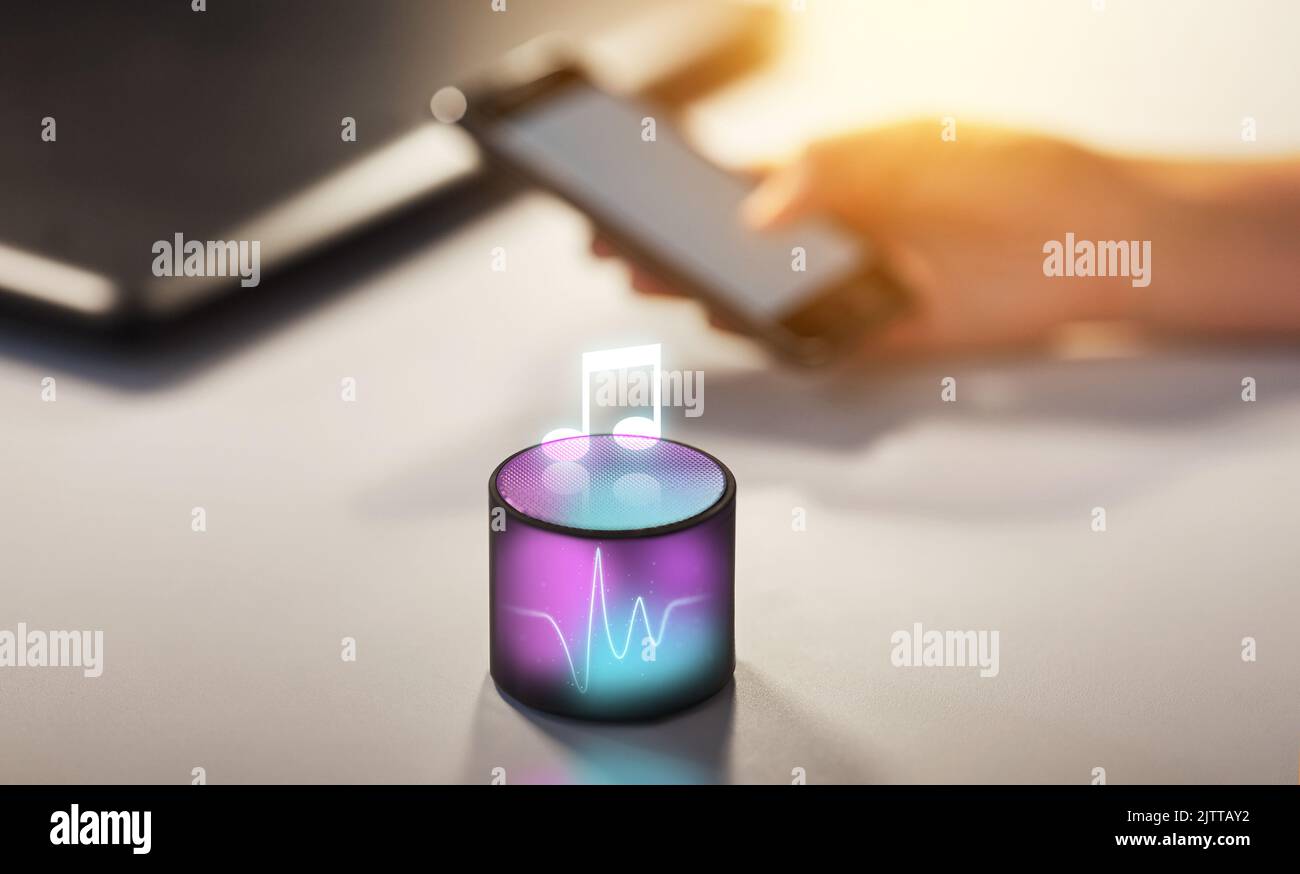 smart speaker with virtual music note hologram Stock Photo - Alamy