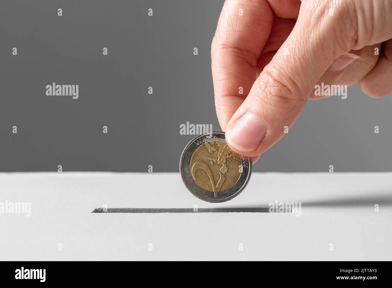 Coin money box hand not piggy bank hi-res stock photography and images ...