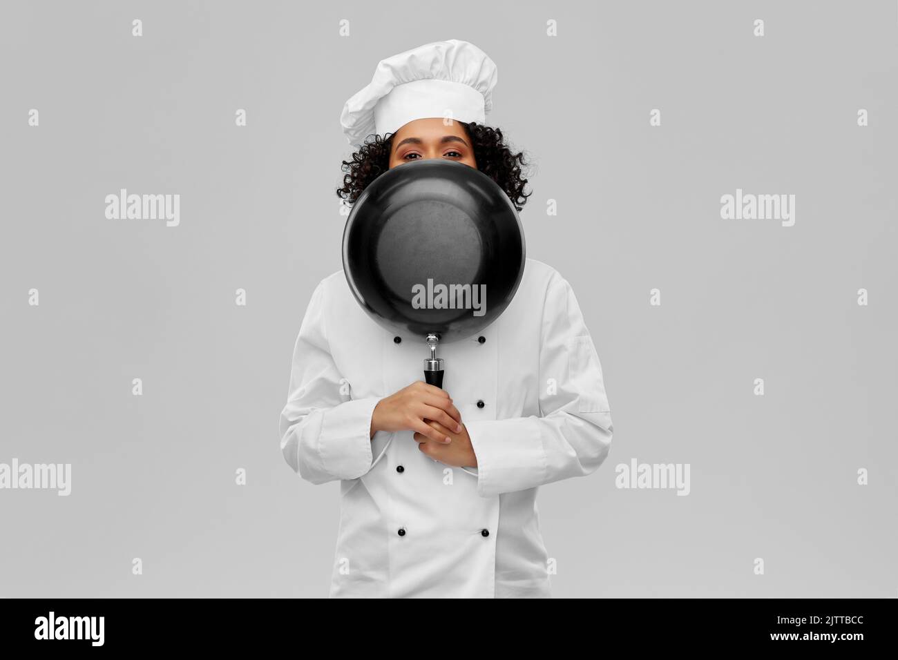 Female chef hiding behind hi-res stock photography and images - Alamy