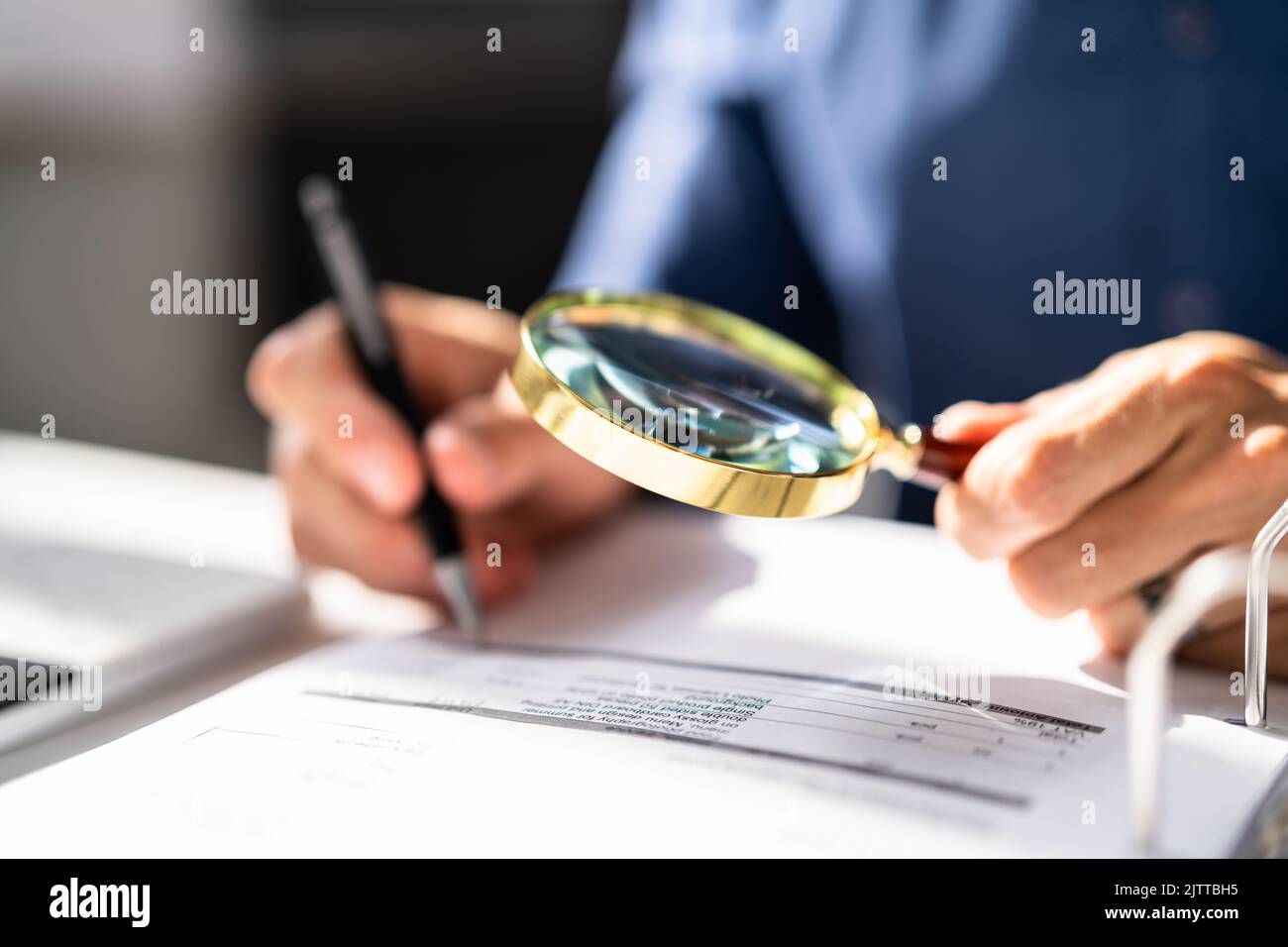 Corporate Auditor Using Magnifying Glass For Tax Fraud Audit Stock ...