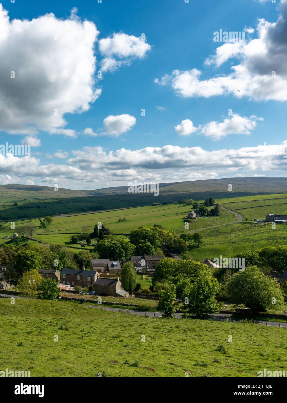 Summer views over Cowshill village and beyond in Weardale, North ...