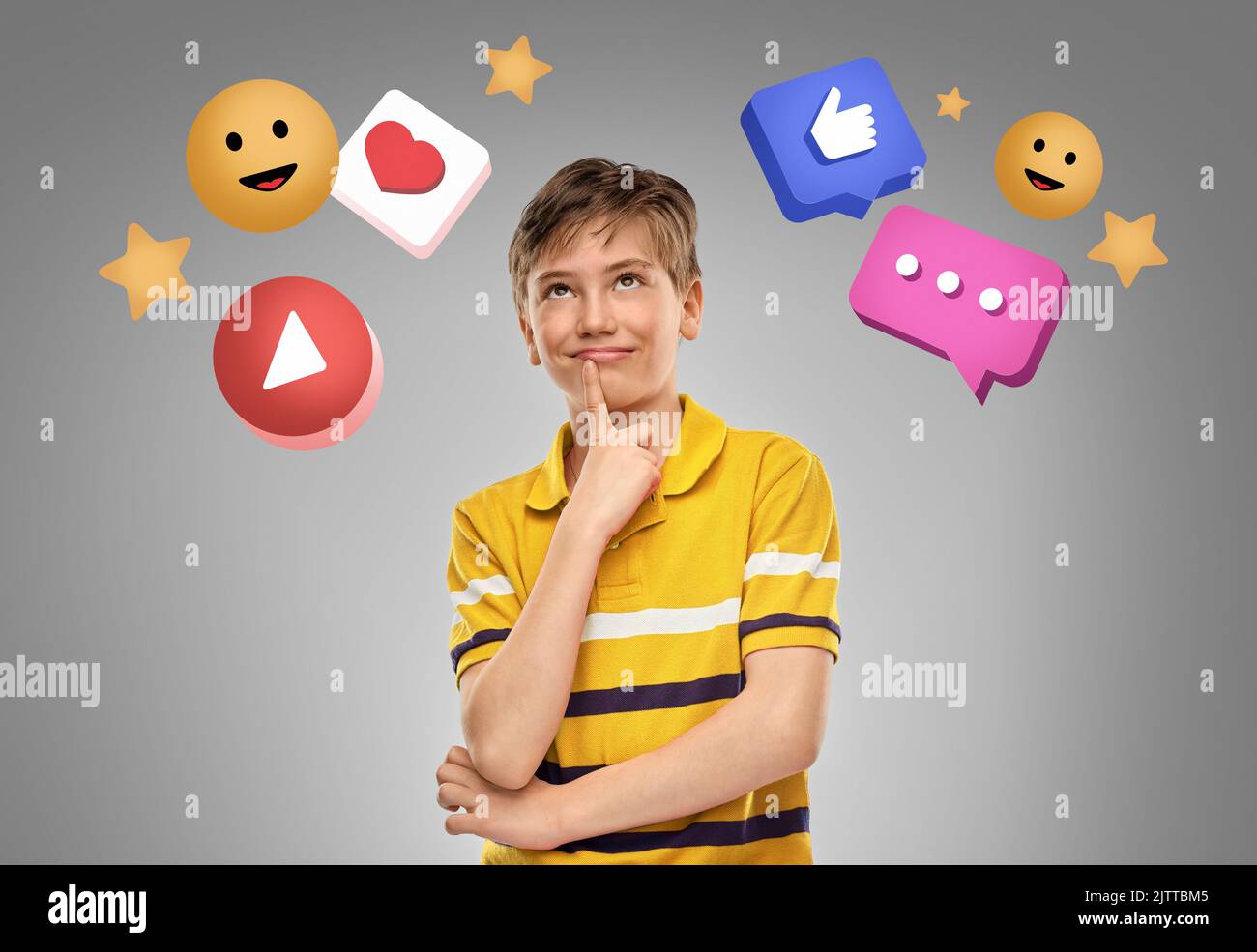 thinking boy looking at internet icons Stock Photo - Alamy