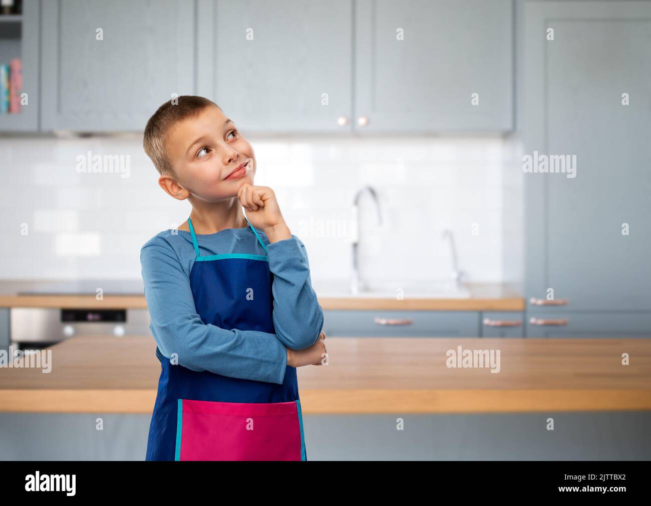 Kid thinking kitchen hi-res stock photography and images - Alamy
