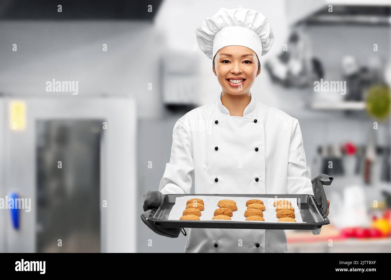 Asian female pastry chef holding hi-res stock photography and images ...