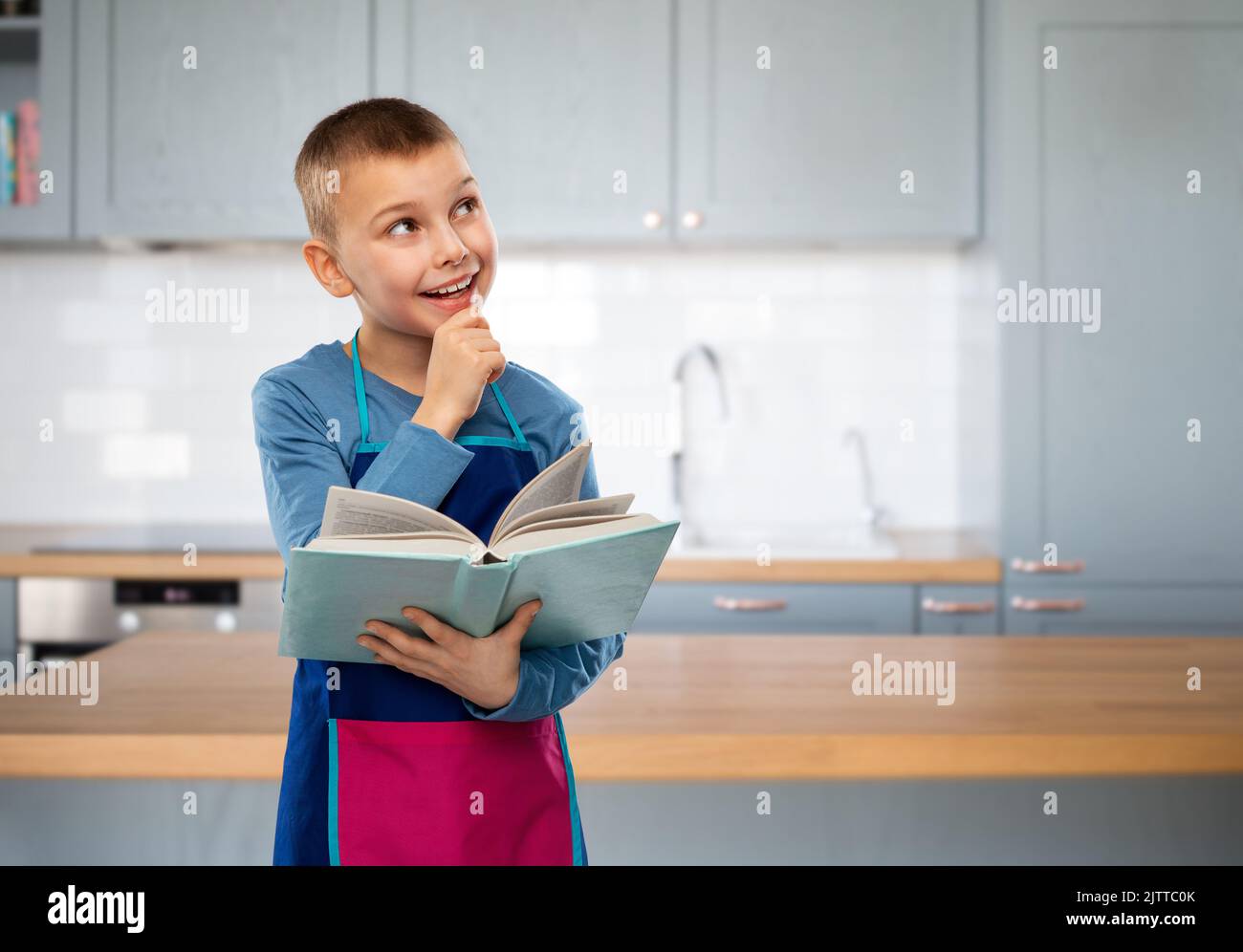 Kid thinking kitchen hi-res stock photography and images - Alamy