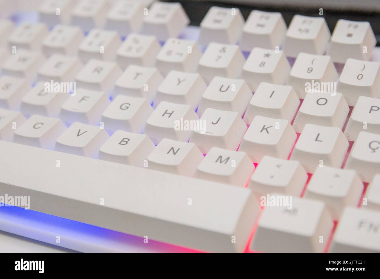 white gamer keyboard with colorful lights in rio de janeiro brazil ...